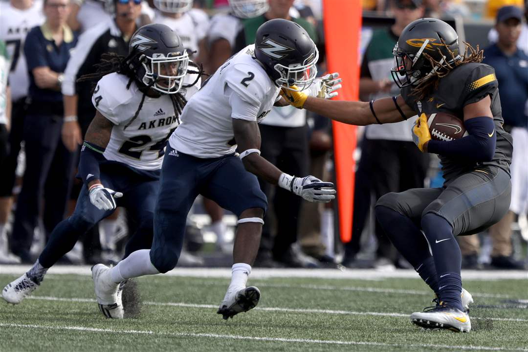 IN PICTURES: Toledo 48, Akron 21 - The Blade